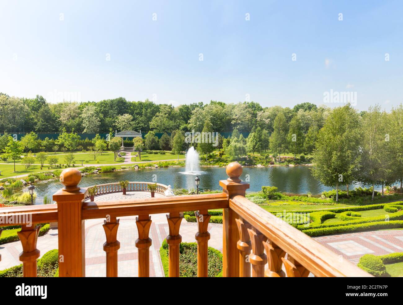 View of beautiful green park with lake from the balcony Stock Photo - Alamy