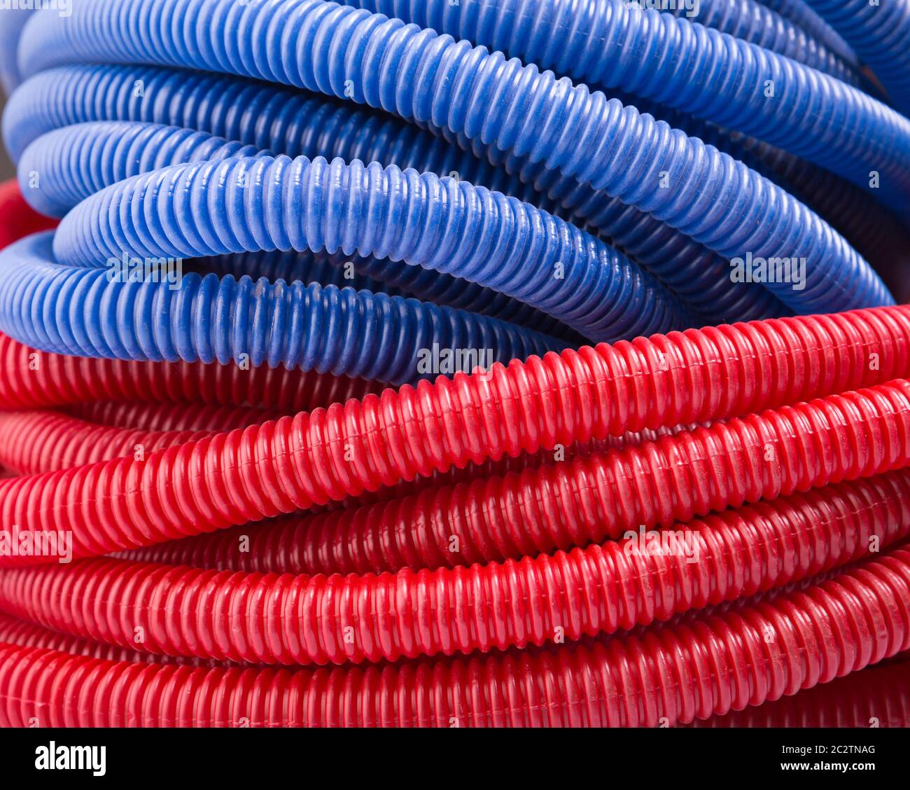 Long blue plastic pipes hi-res stock photography and images - Alamy