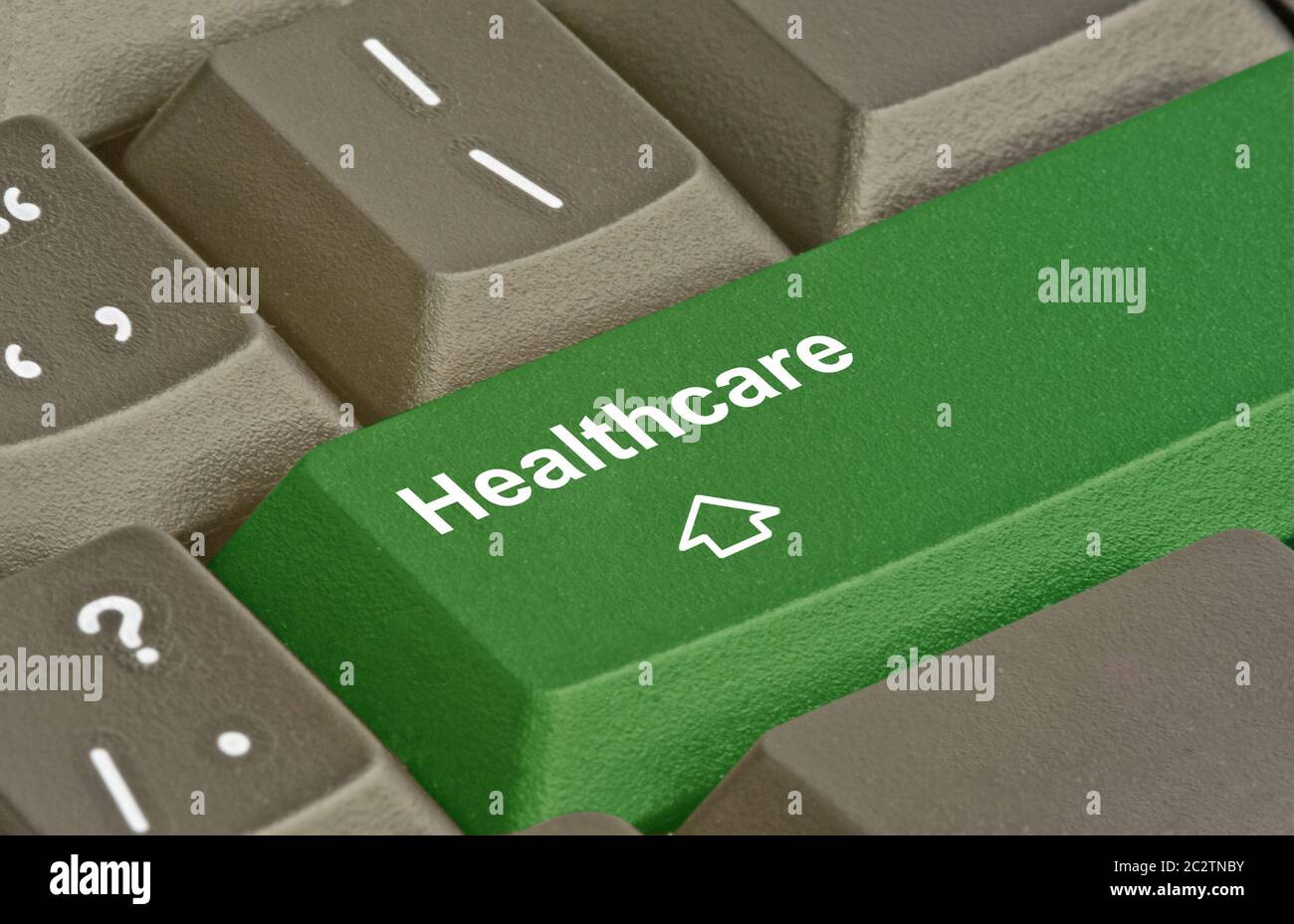 keyboard with key for healthcare Stock Photo - Alamy