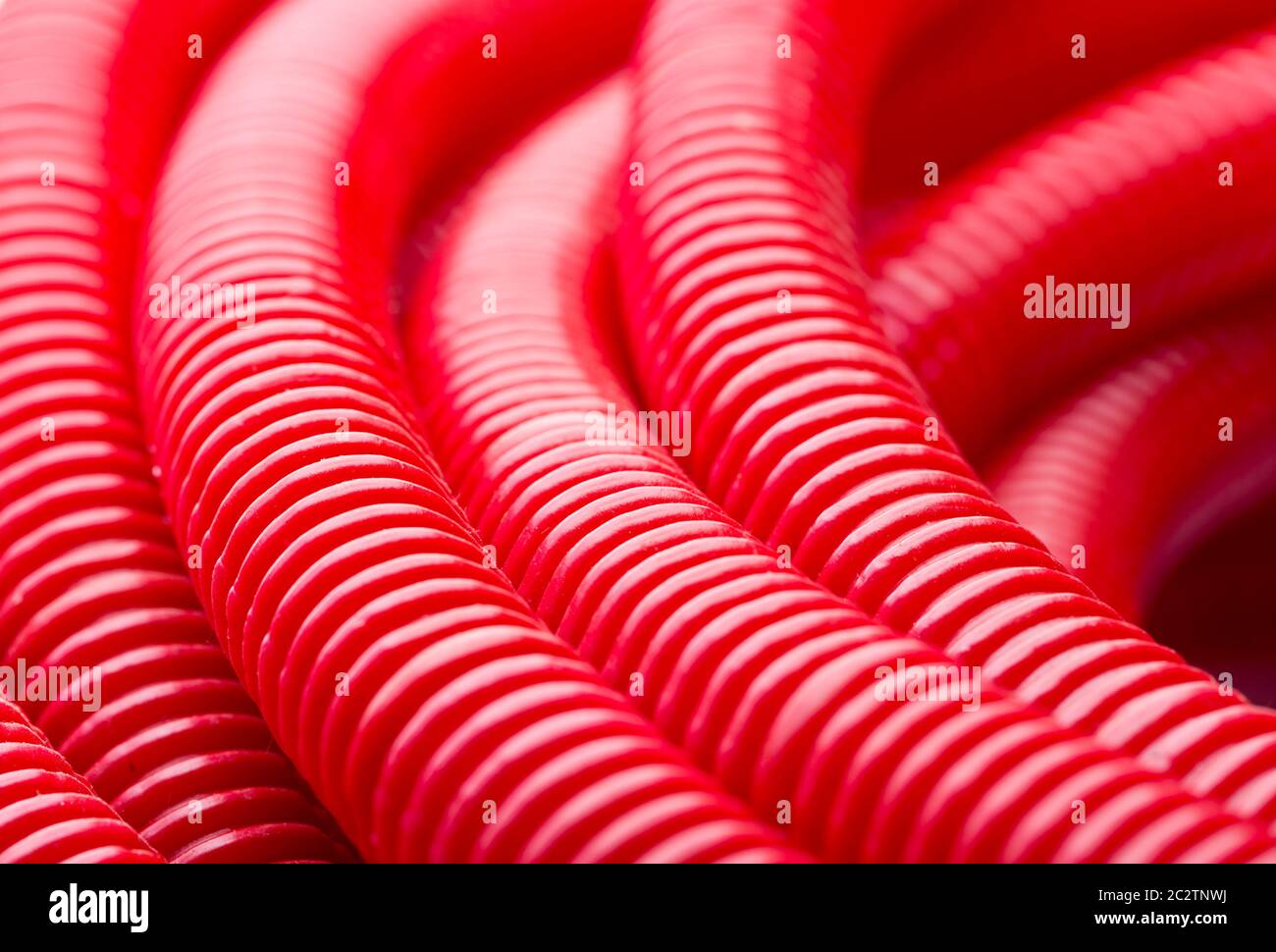 Closeup of long red water pipe Stock Photo - Alamy