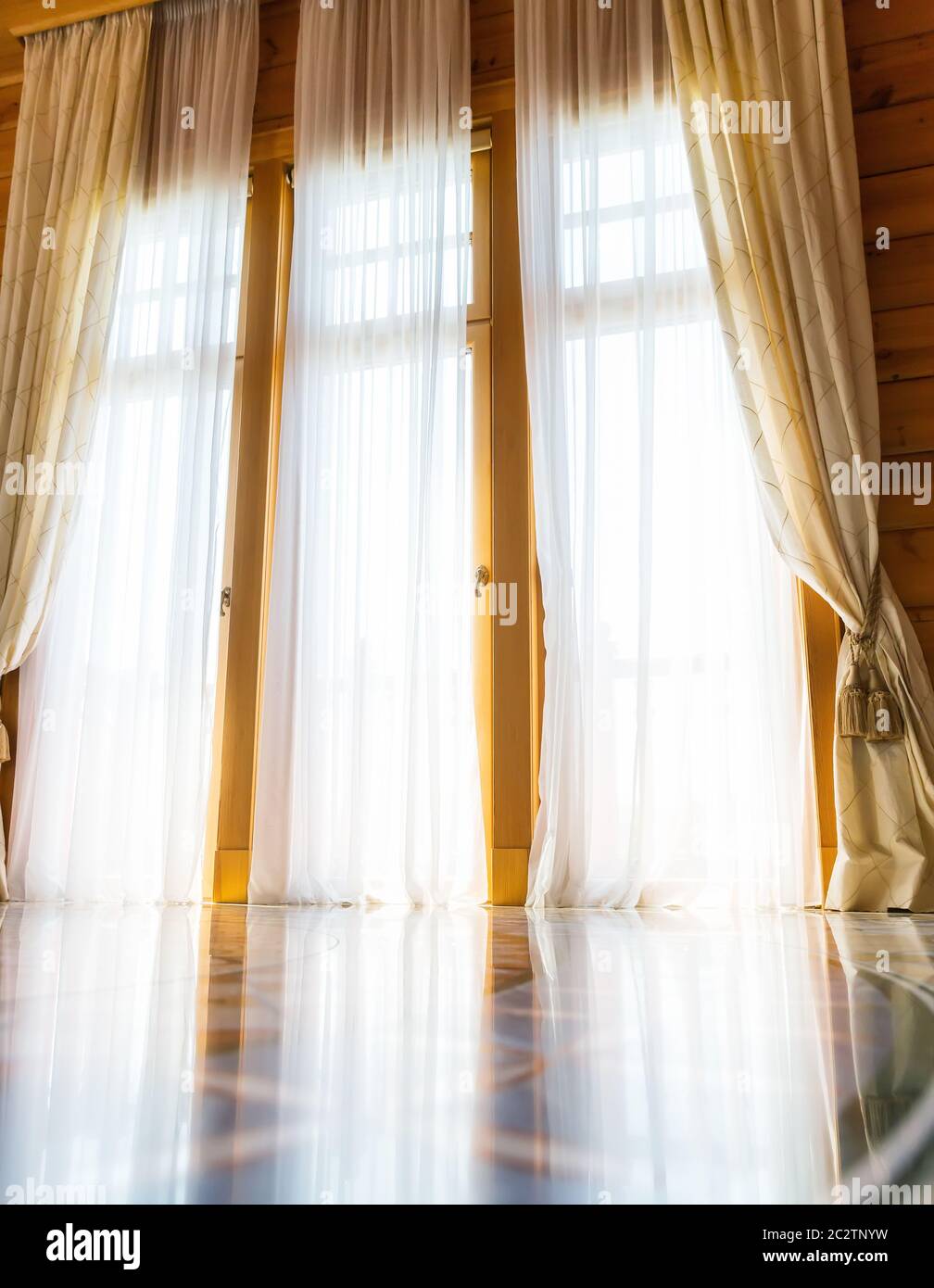 Elegance entrance door with modern curtains Stock Photo - Alamy