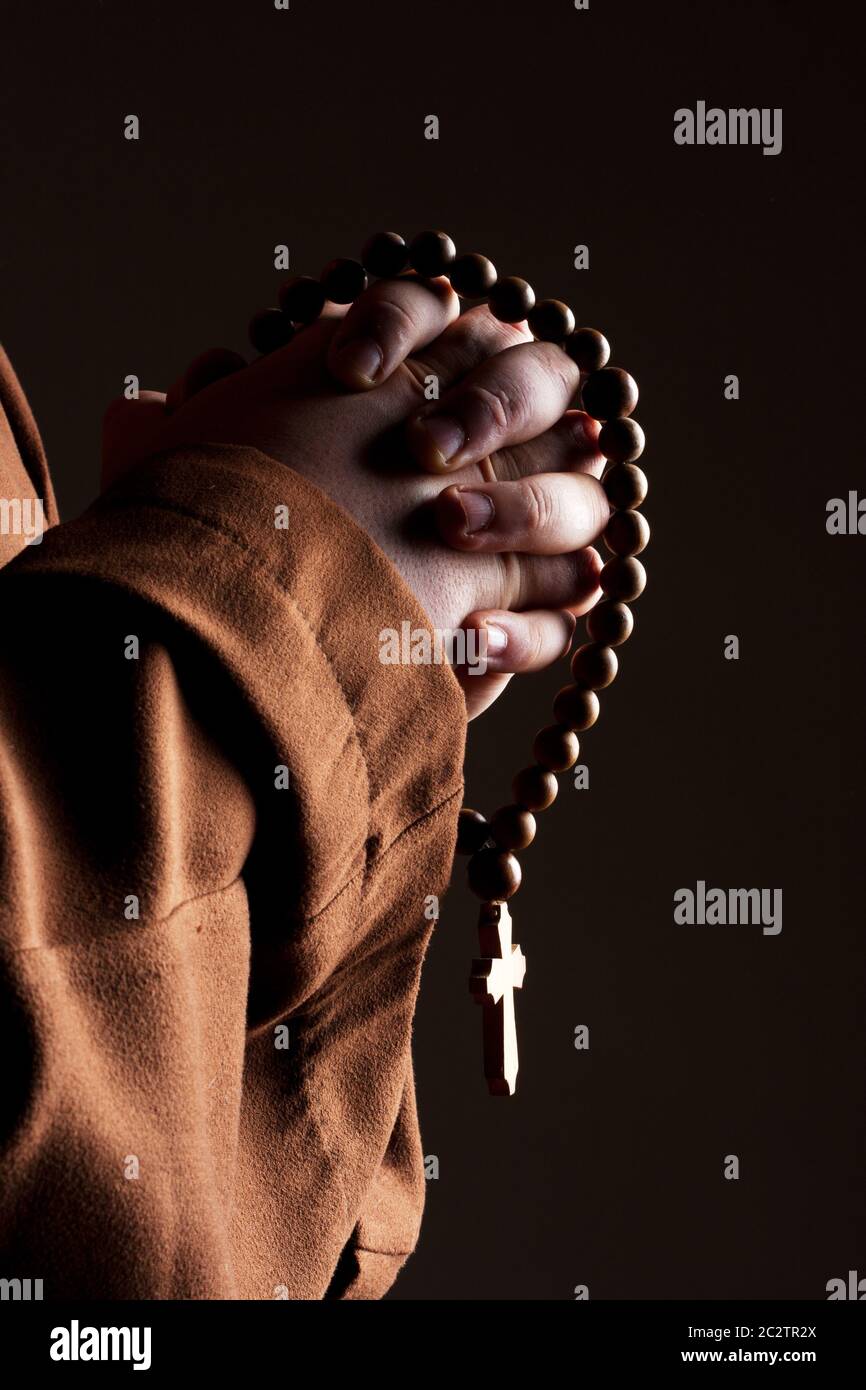 Monk hands in prayer hi-res stock photography and images - Alamy