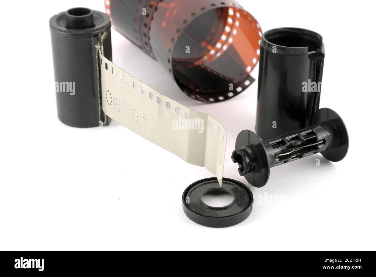 Old negative film with cassette over white Stock Photo - Alamy