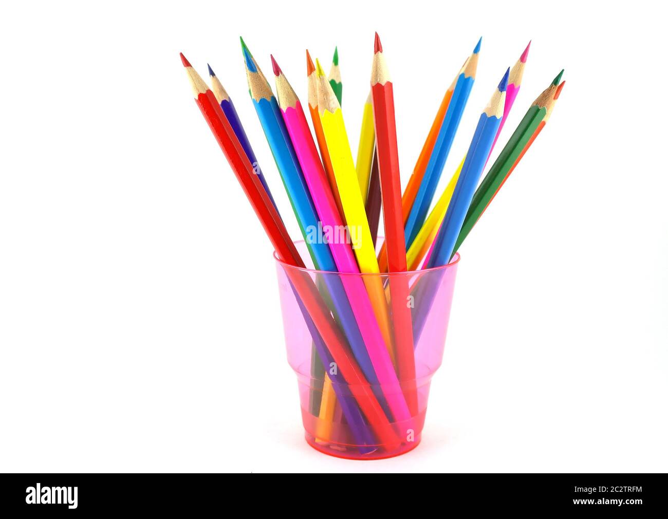 Color pencils in the pink prop over white Stock Photo - Alamy