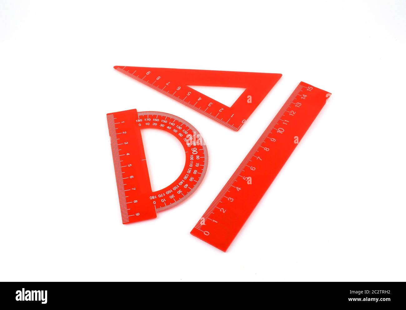 Triangle, protractor and ruler over white Stock Photo - Alamy