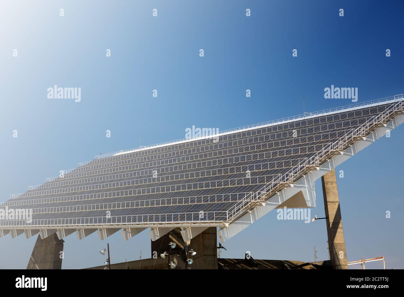 Giant solar panel against blue sky Stock Photo - Alamy