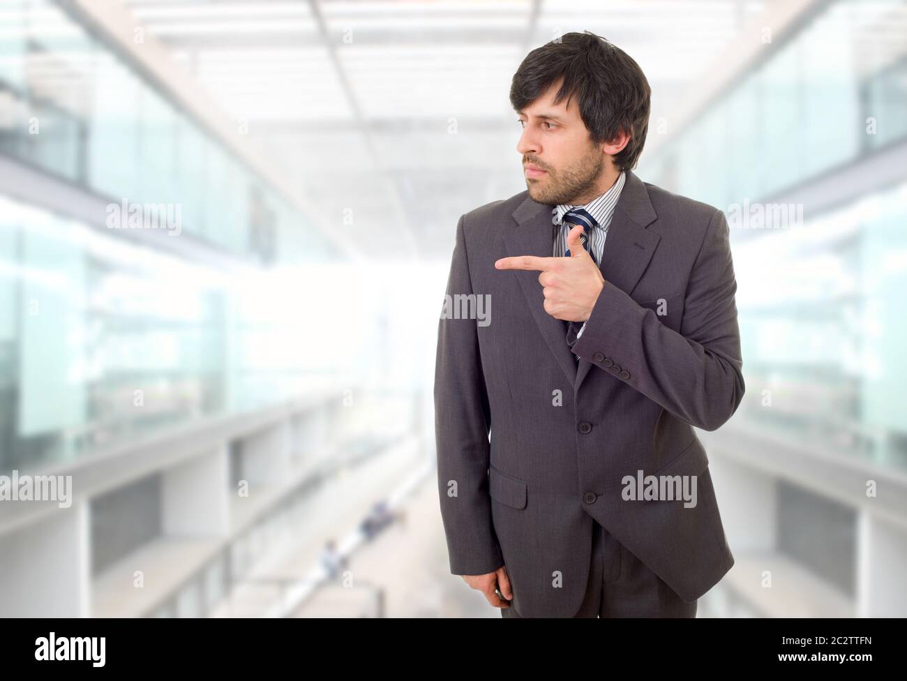 business man pointing, at the office Stock Photo - Alamy