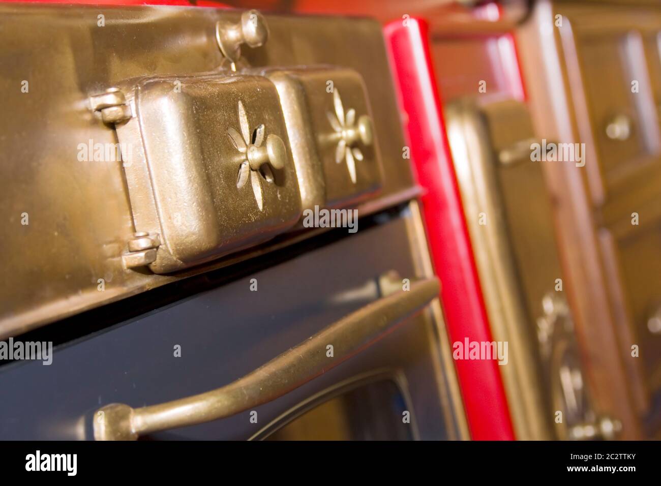 Retro bronze stove on kitchen Stock Photo - Alamy
