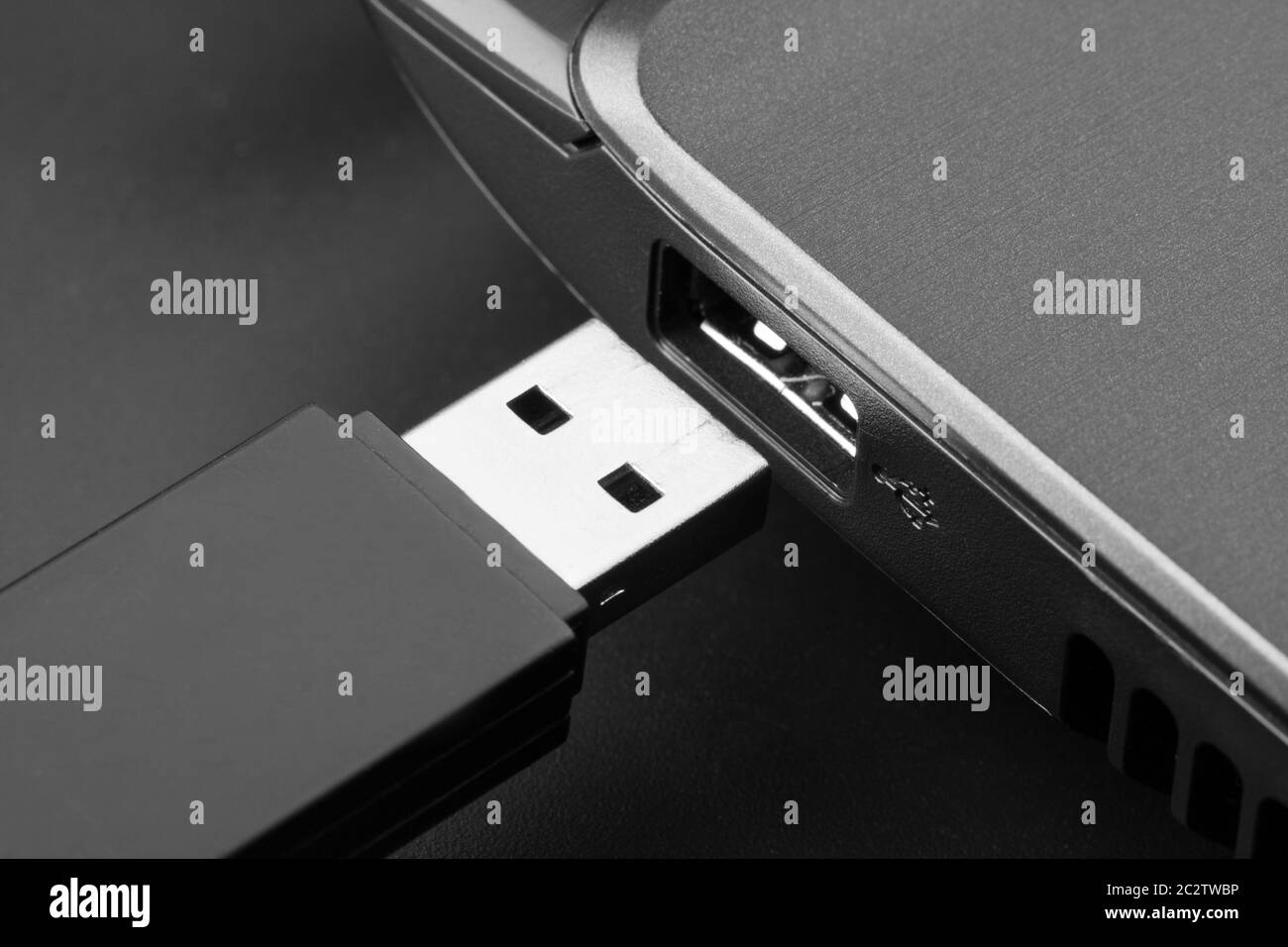 Plugging removable flash disk memory into laptop USB slot Stock Photo ...