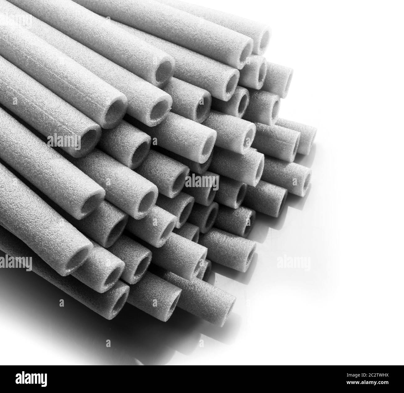 Insulation for pipes isolated on white Stock Photo - Alamy
