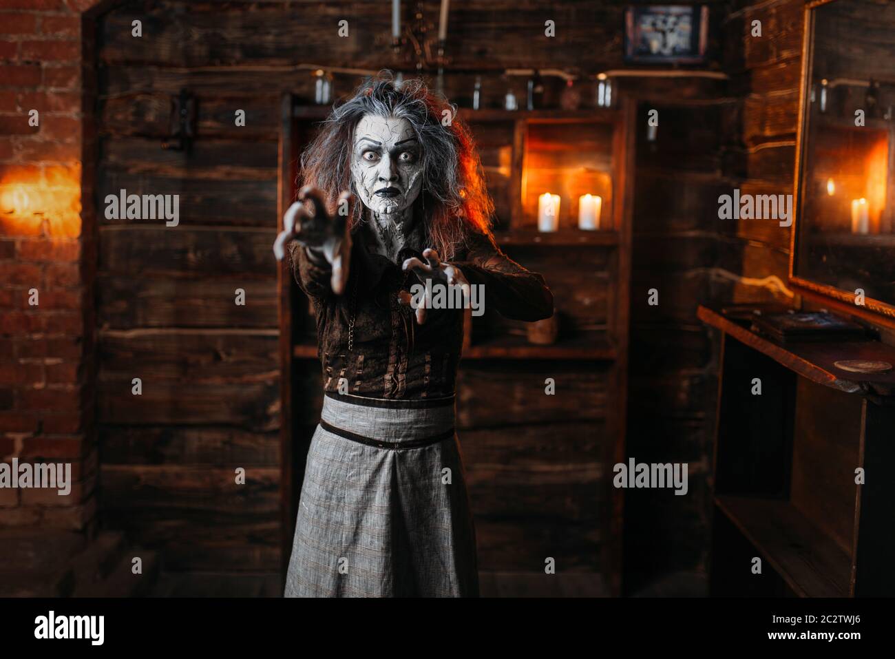 Scary witch hands out, front view, spiritual seance. Female foreteller ...