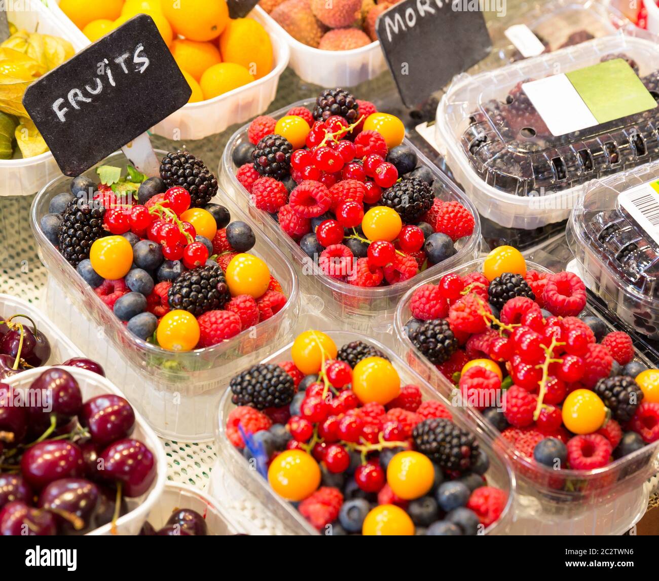 Assorted colorful berries in boxes Stock Photo - Alamy