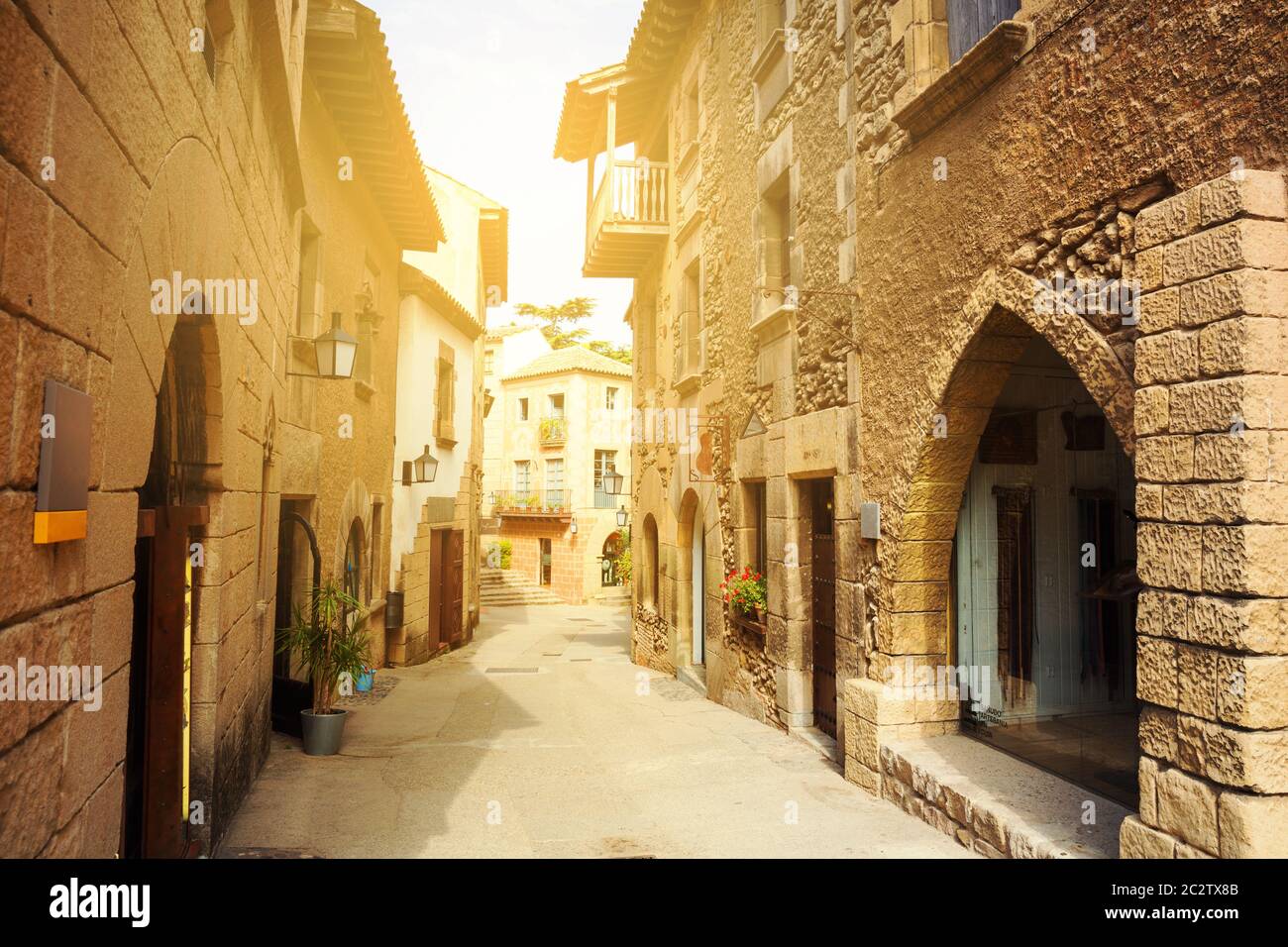 Spanish suburban street at sunset Stock Photo - Alamy