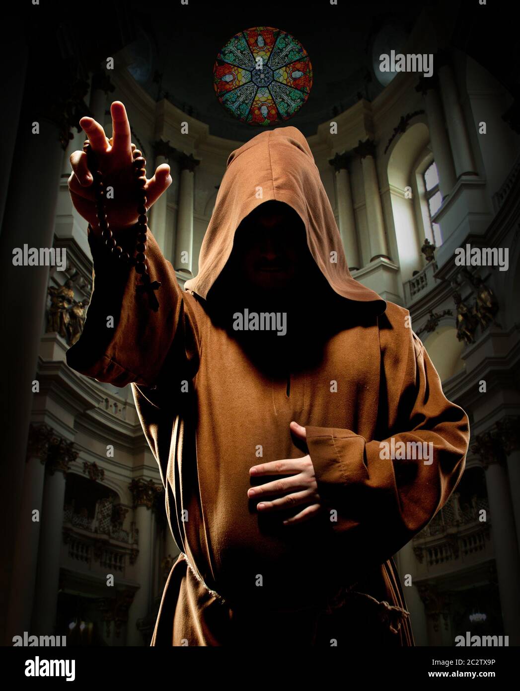 Portrait of preaching medieval monk in church Stock Photo - Alamy