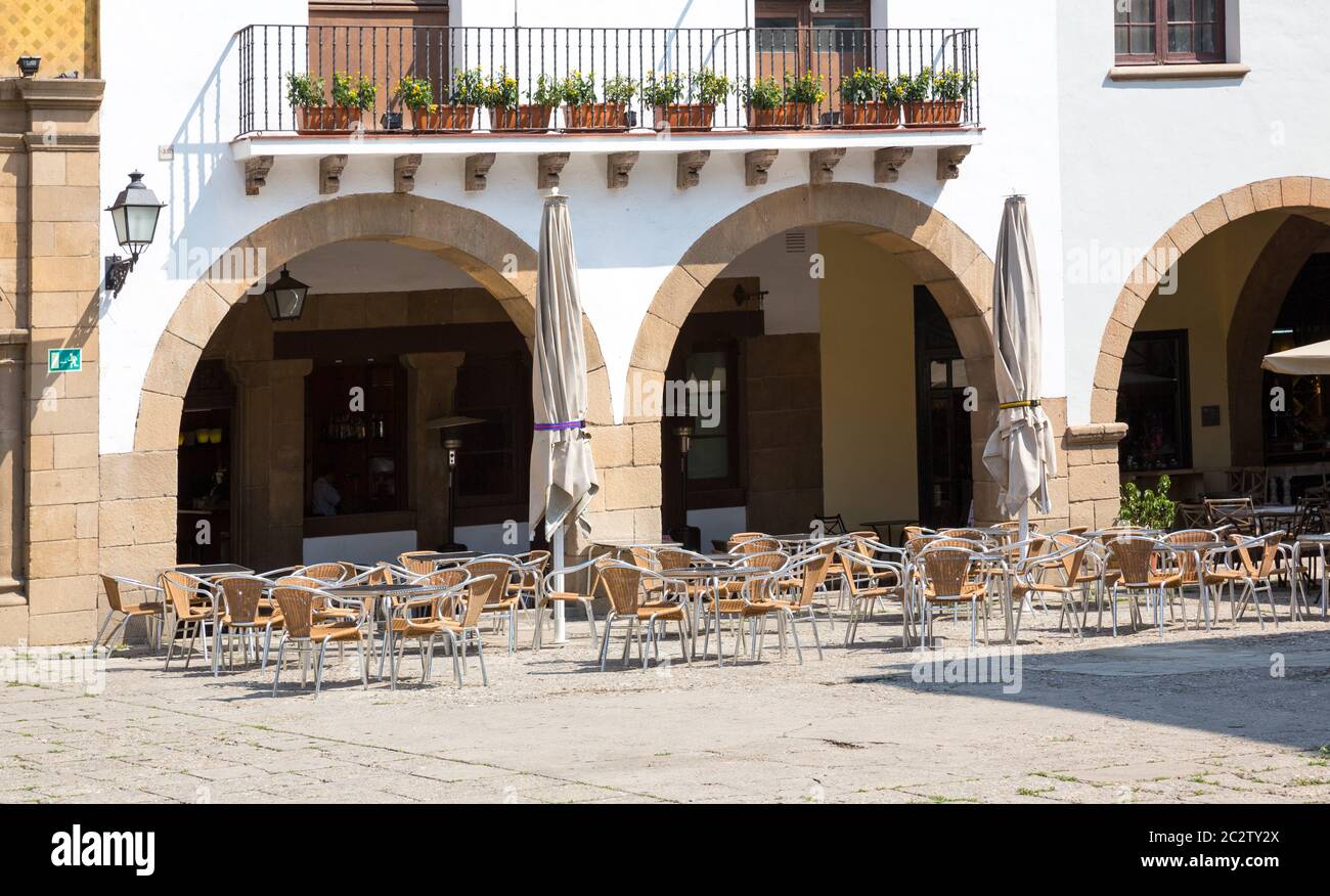 Restaurant tables on old european square Stock Photo - Alamy