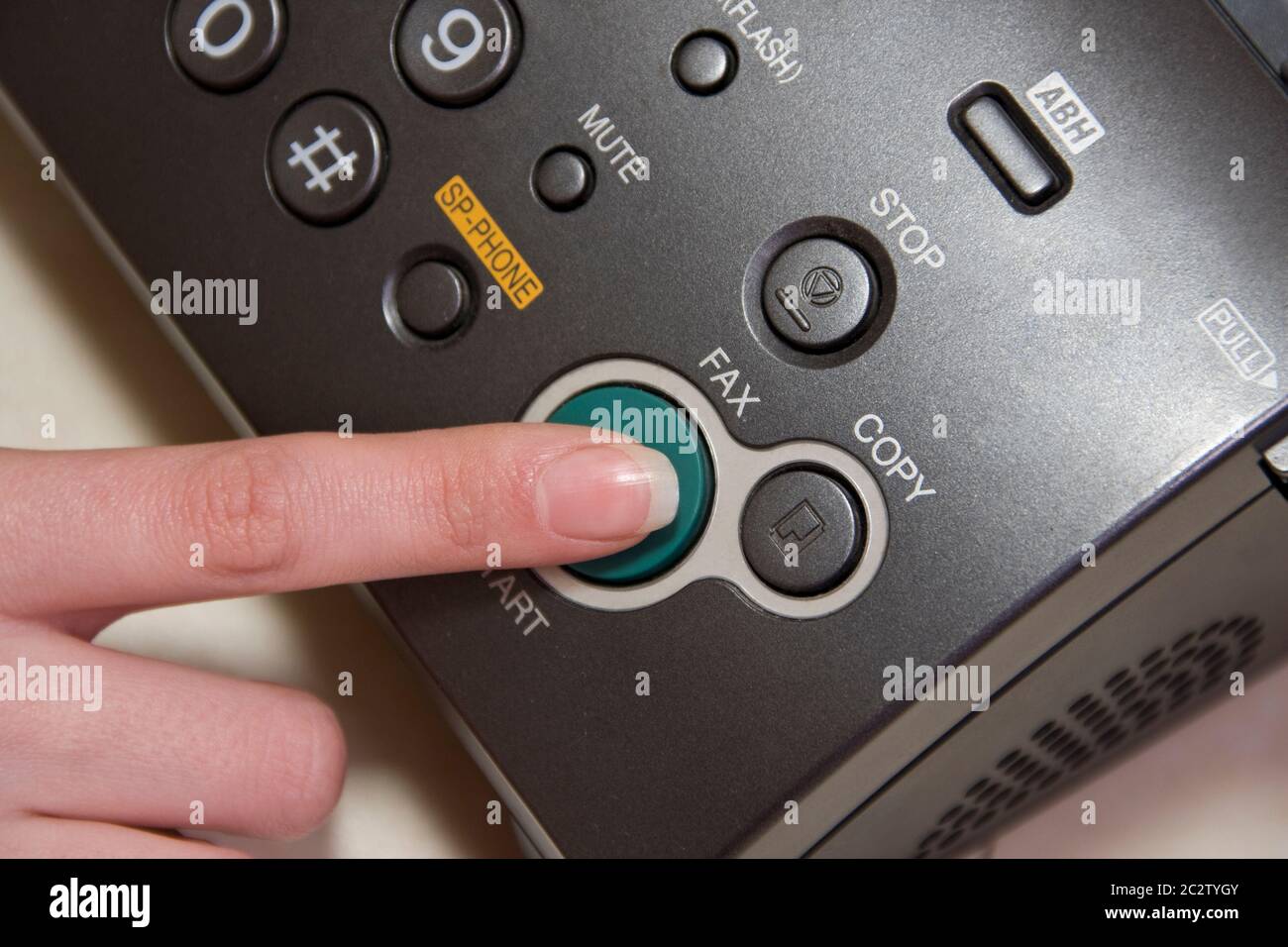 Using fax machine Stock Photo - Alamy