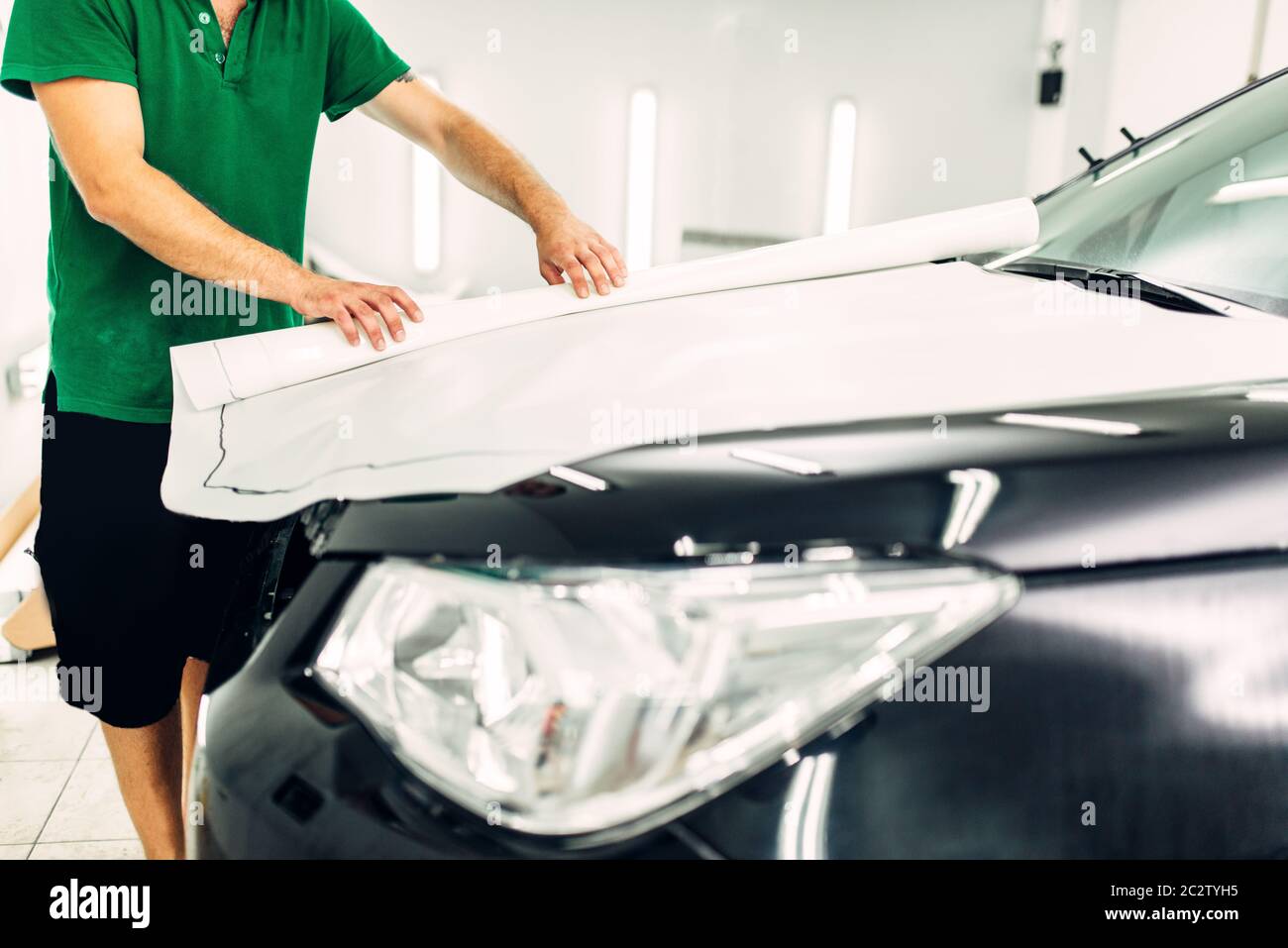 Car paint protection film installation process. Protect against chips ...