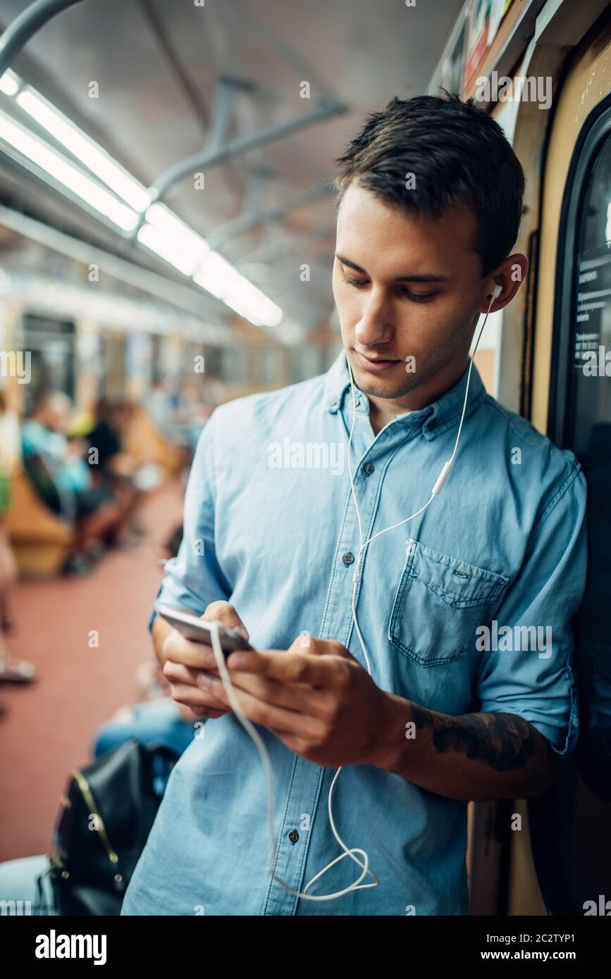 Phone addict man using gadget in metro, addiction problem, social ...
