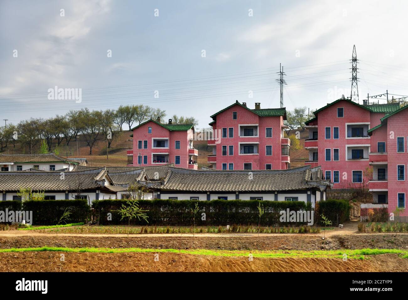 Countryside landscape, agricultural fields and urban village with ...