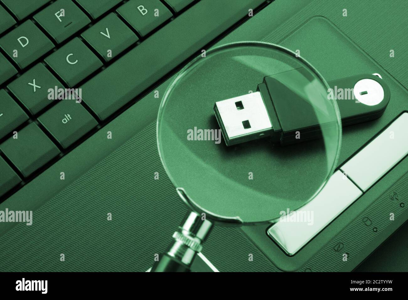 Magnifying glass focused on the removable flash drive Stock Photo - Alamy