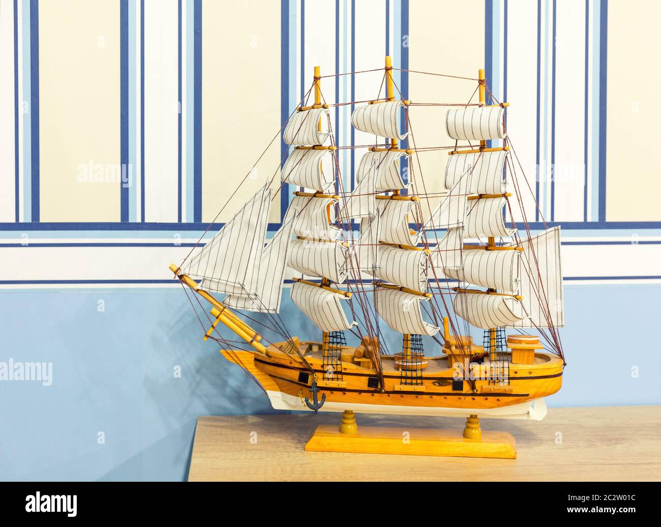Close up shot of sail ship model on the white and blue background Stock ...