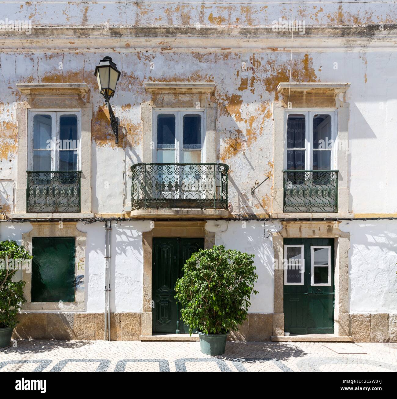 Close up of old ragged building with faded paint Stock Photo - Alamy