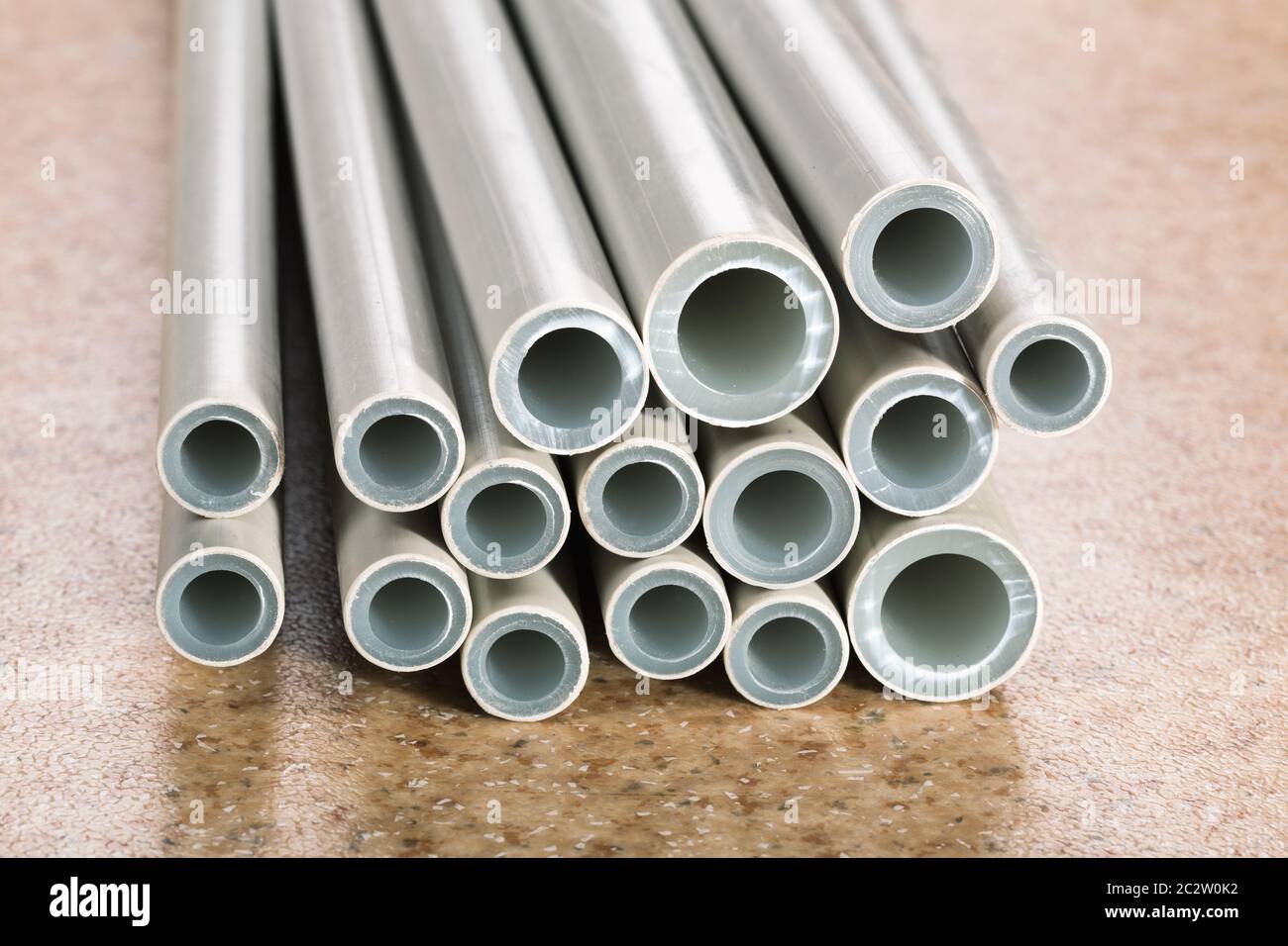 Industrial plastic pipes. Macro view Stock Photo - Alamy