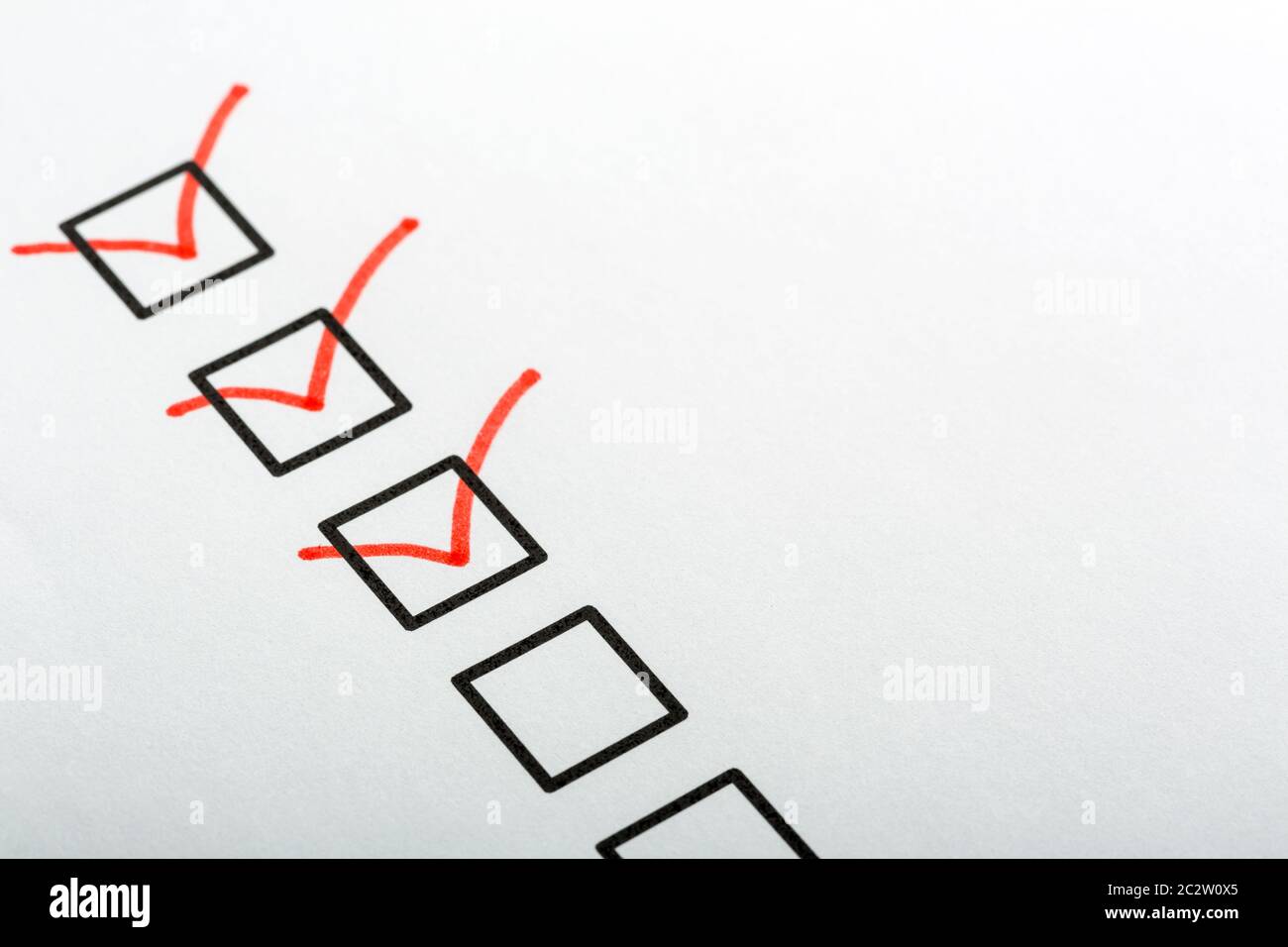 Check boxes on white background Stock Photo - Alamy