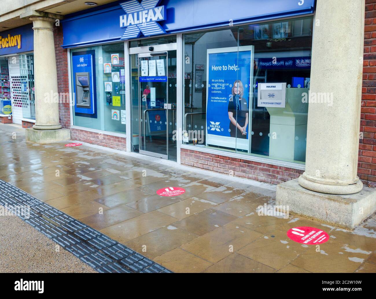Chester, UK: Jun 14, 2020: A Halifax Bank has markers on the pavement ...