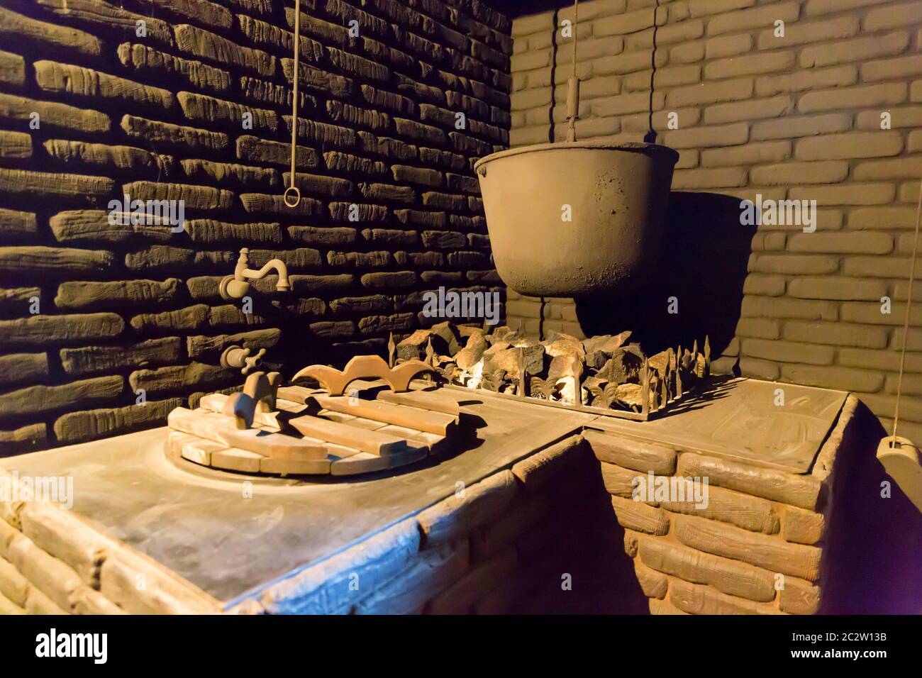 Cauldron for boiling water in the bath-house room Stock Photo - Alamy