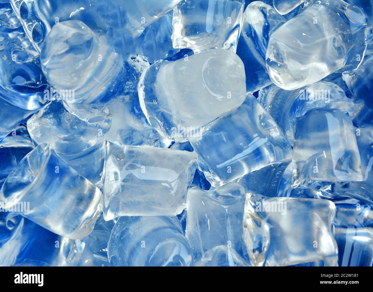 Ice unit on blue background Stock Photo - Alamy
