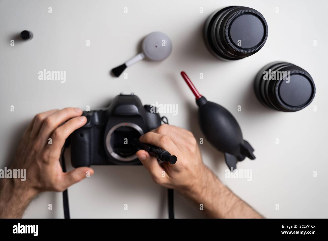 Man cleaning sensor hi-res stock photography and images - Alamy