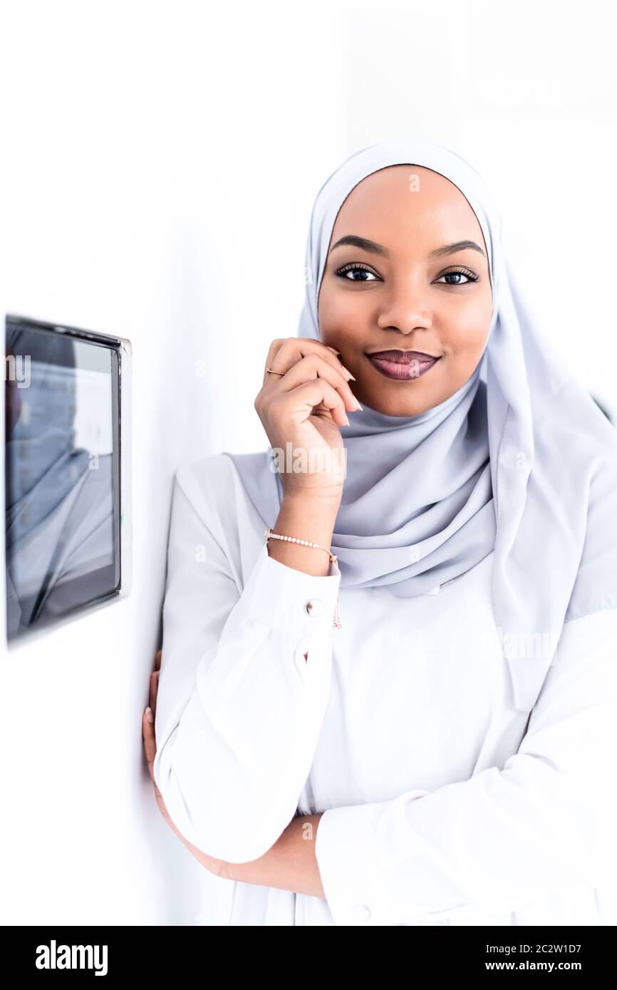 african woman using smart home screen Stock Photo - Alamy