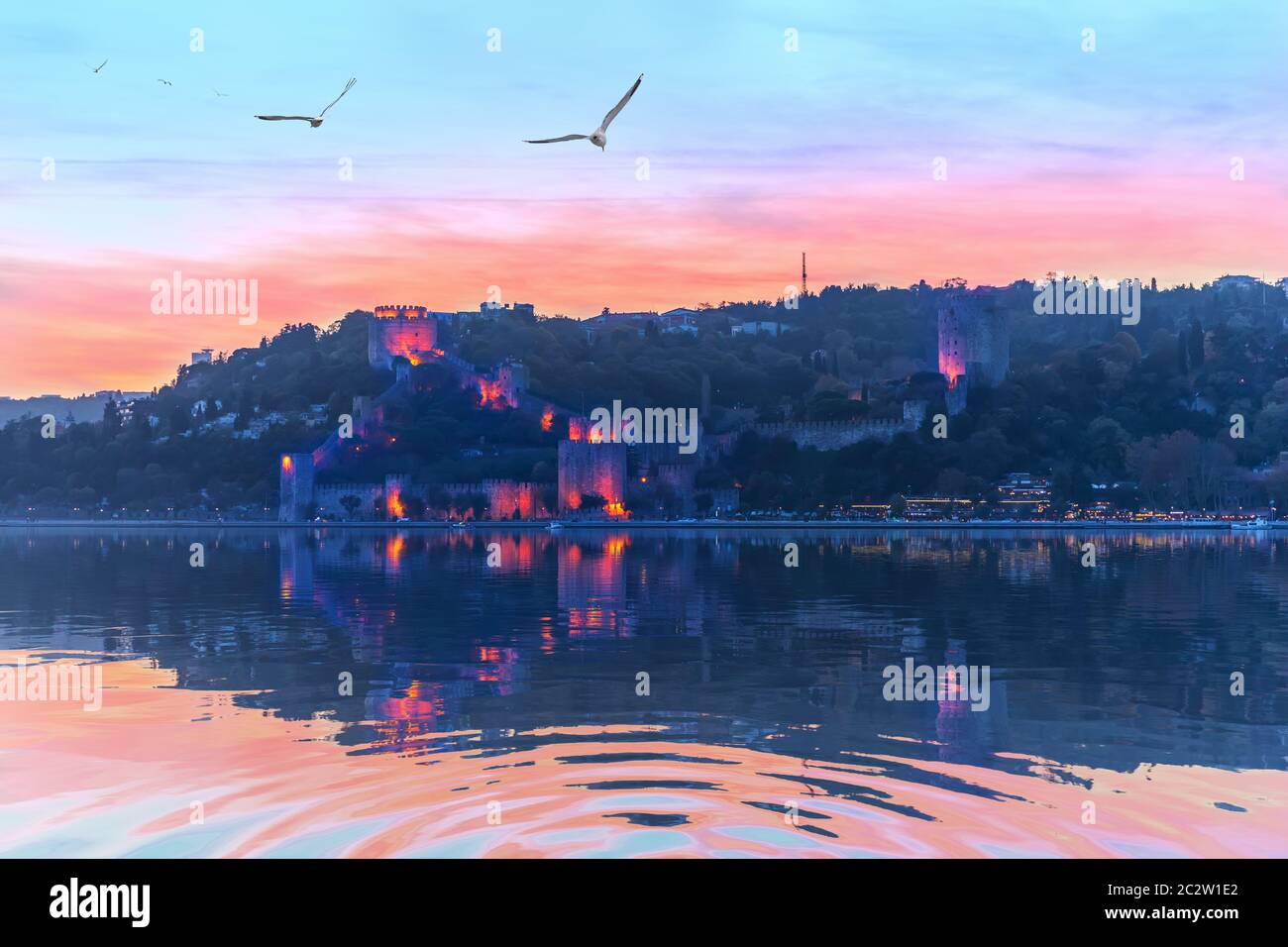 Rumelian Castle in the sunset colours and evening lights, Istanbul ...