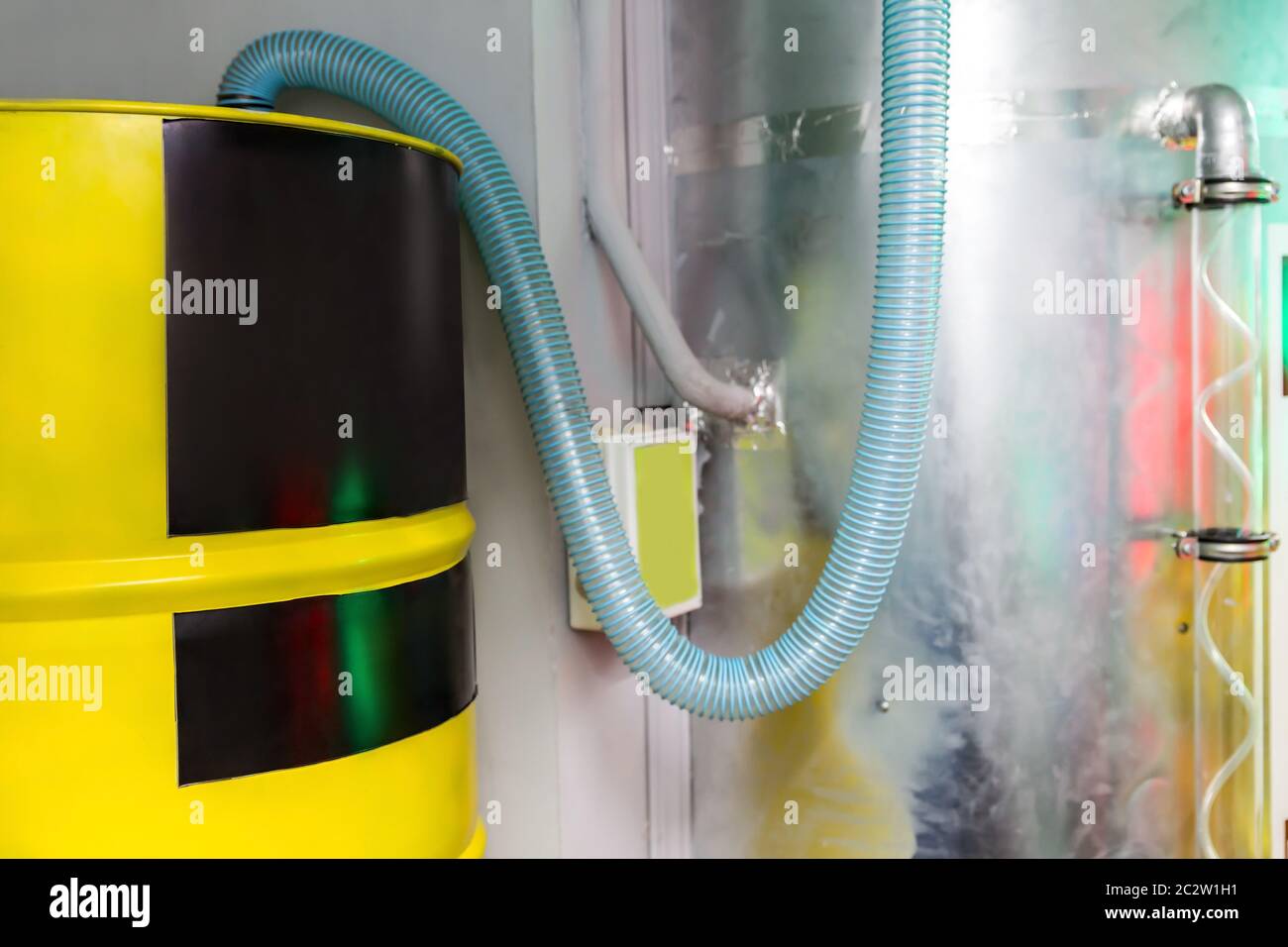 Big yellow barrel in chemical lab Stock Photo - Alamy