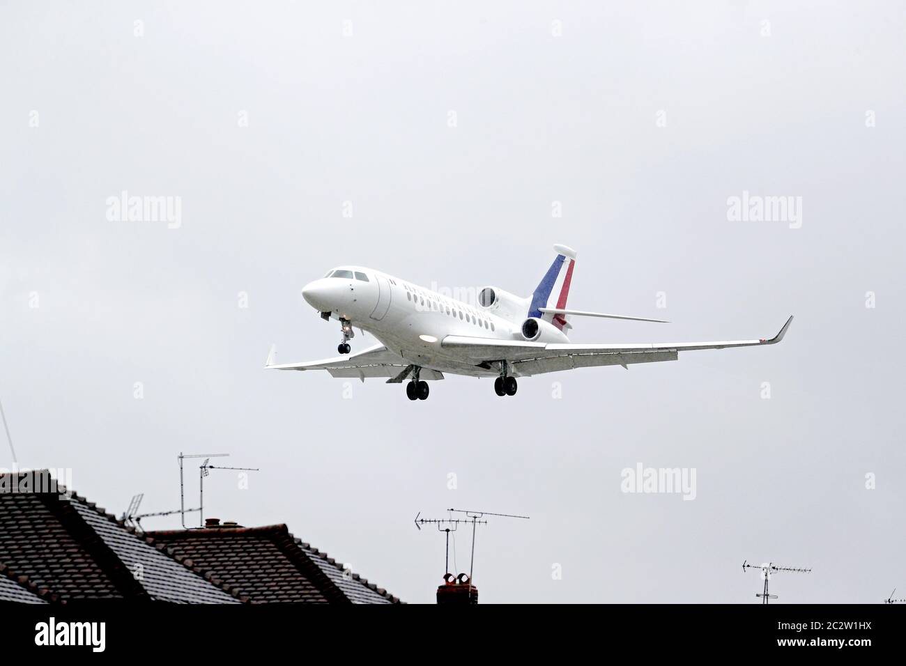 A plane carrying French president Emmanuel Macron lands at RAF Northolt ...
