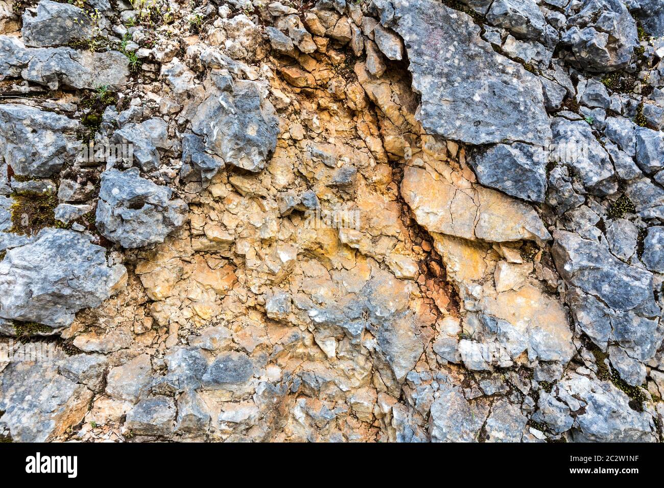 Cracked rock wall. Texture or background Stock Photo - Alamy