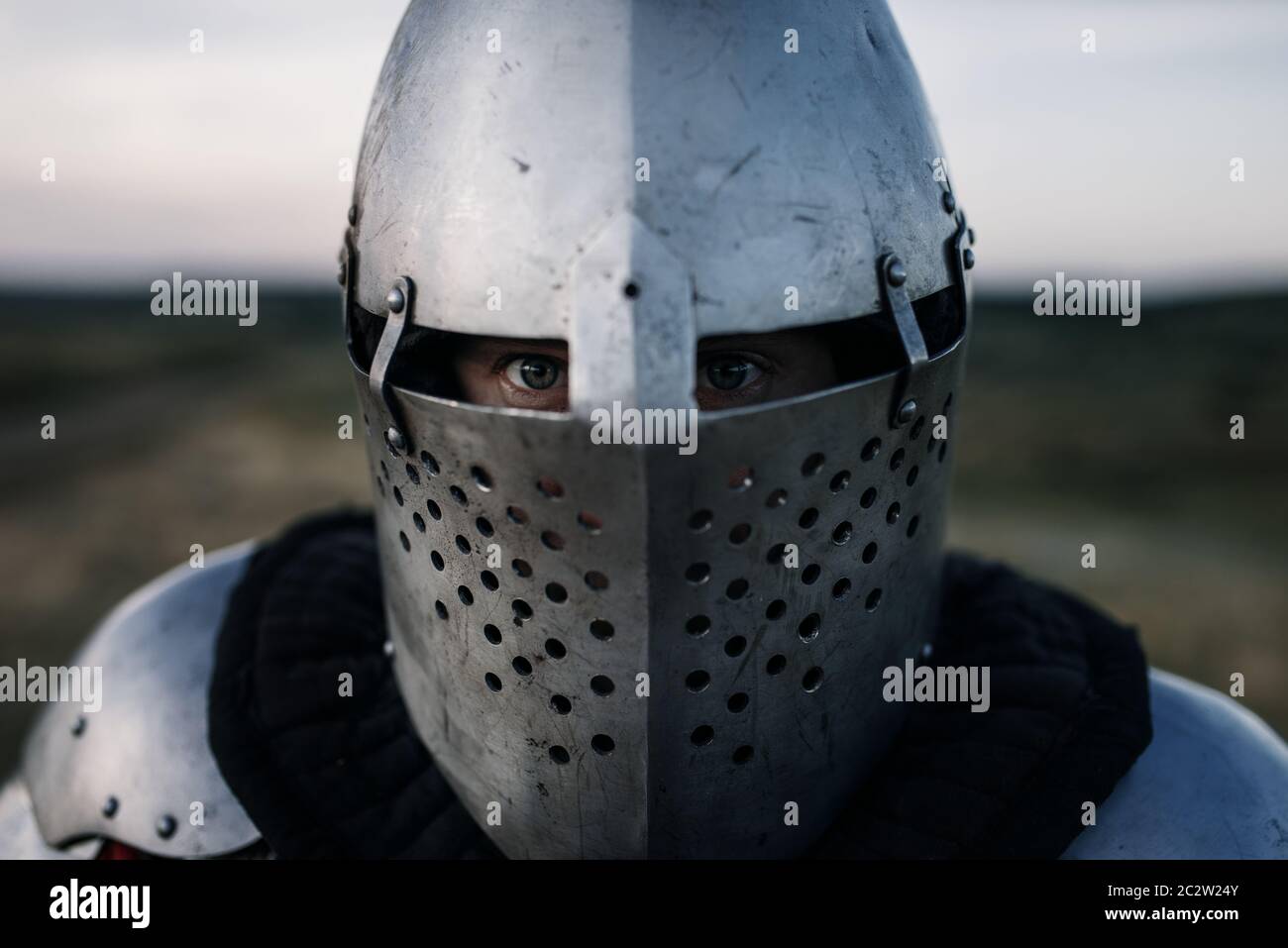 Medieval knight in armor and helmet closeup view, great battle. Armored ...