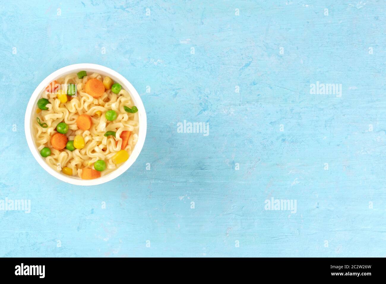 Ramen cup, instant noodles in a plastic cup, shot from the top on a ...