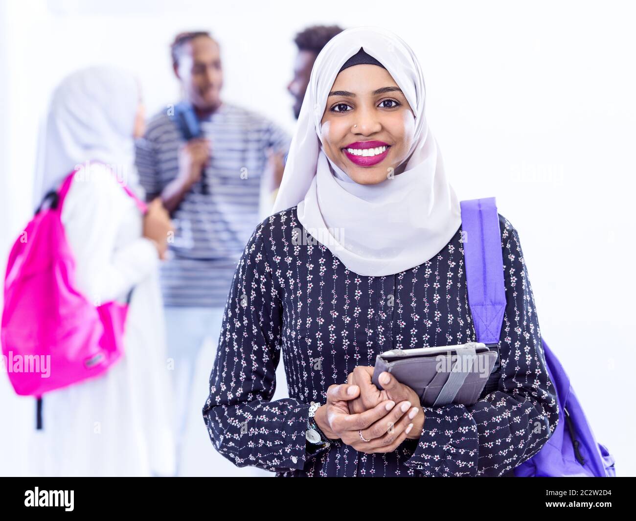 muslim female student with group of friends Stock Photo - Alamy