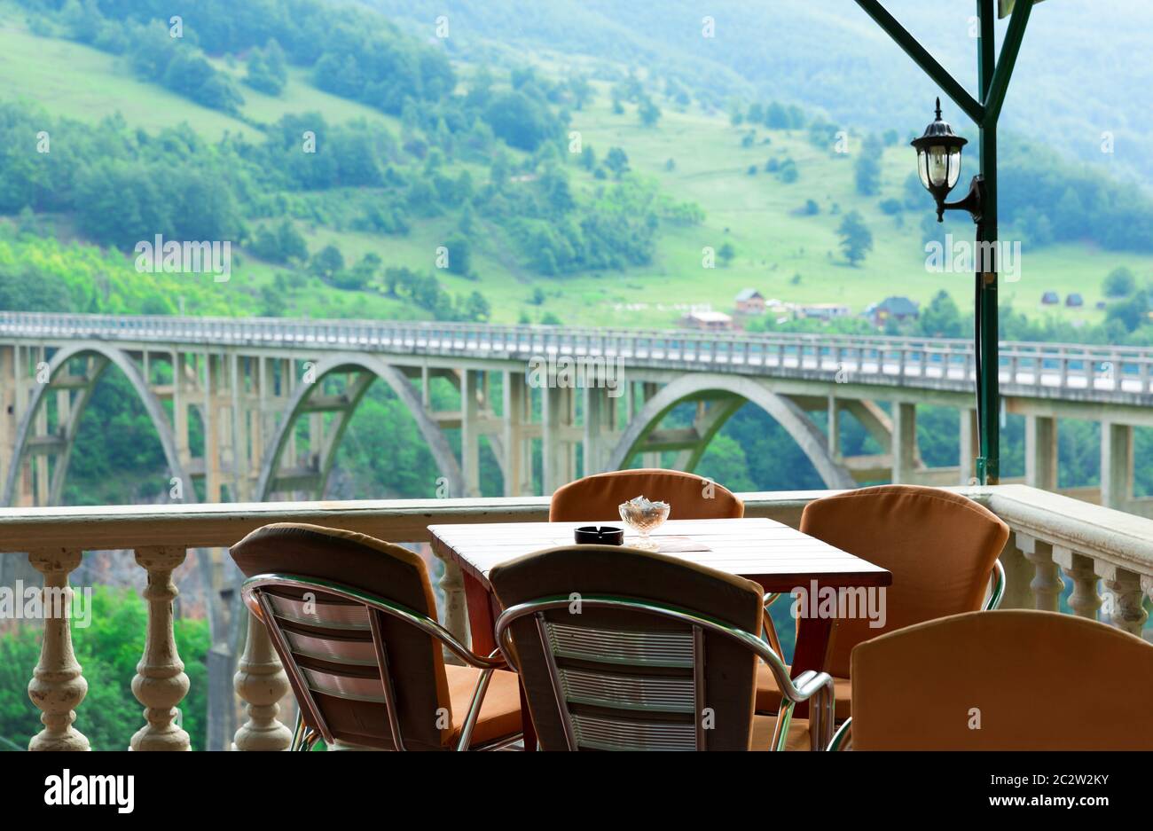 View from balcony of small cafe Stock Photo - Alamy