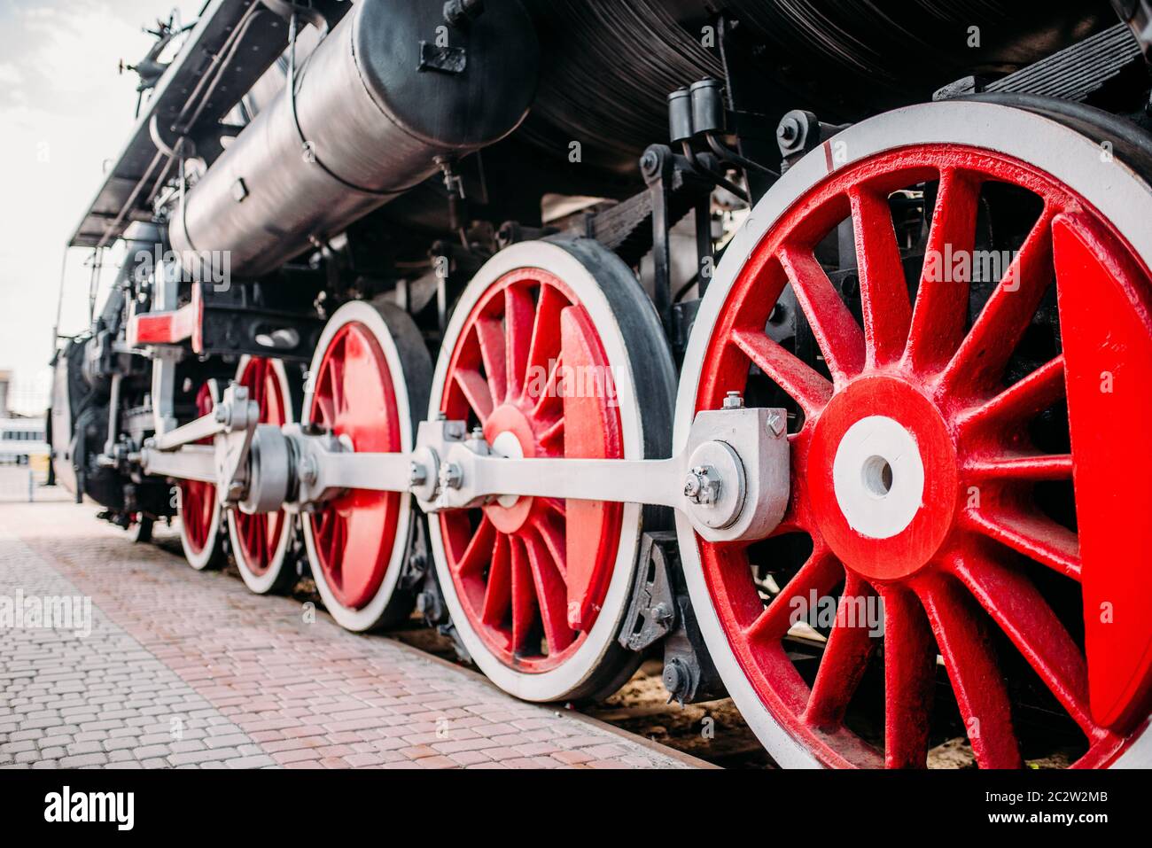 Old steam train, red wheels closeup. Vintage locomotive. Railway engine ...