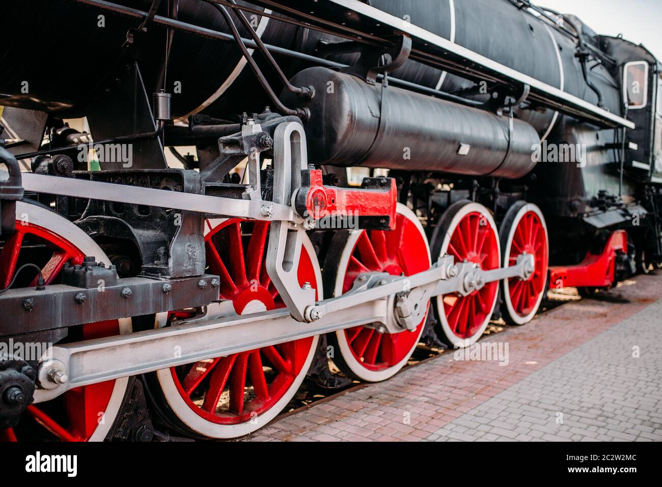 Old steam train, red wheels closeup. Vintage locomotive. Railway engine ...