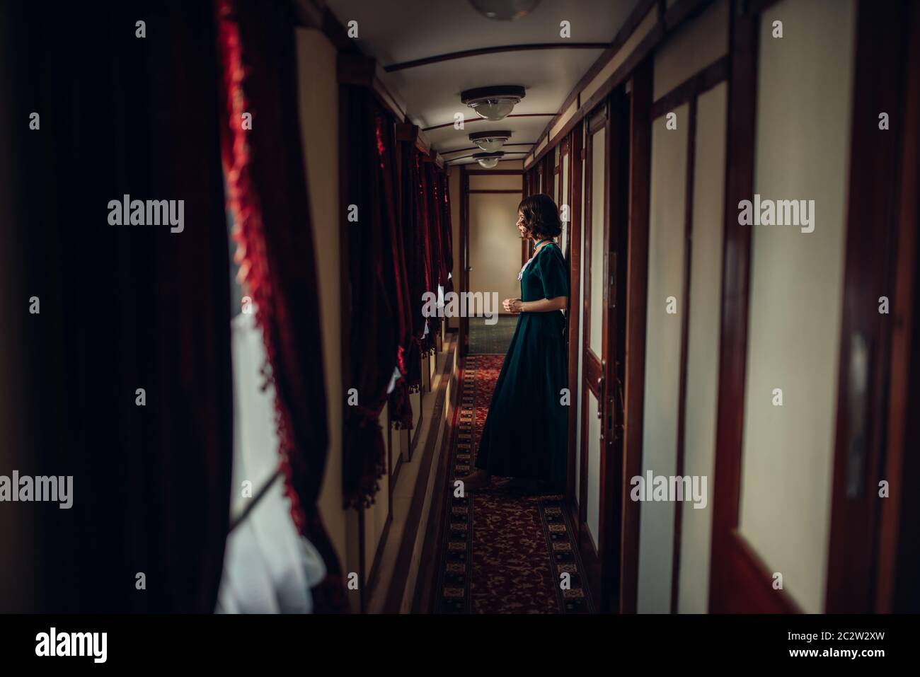Young woman travels, vintage train compartment. Old wagon interior ...