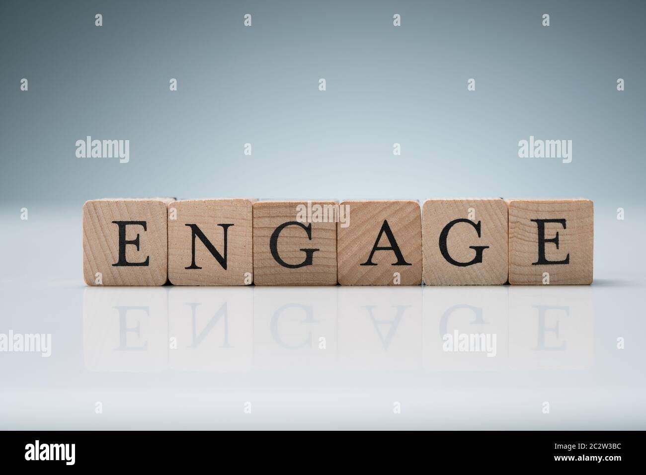 Close-up Of Wooden Blocks Arranged In A Row Showing Engage Text Over ...