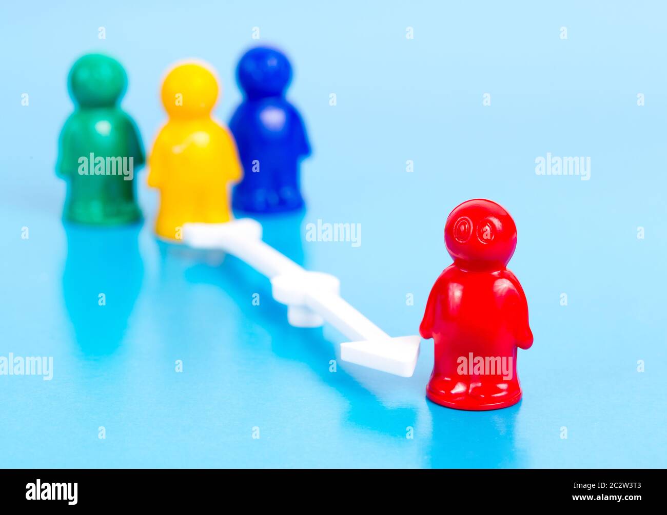 Responsibility concept. Small toy people and arrow pointing to the red ...