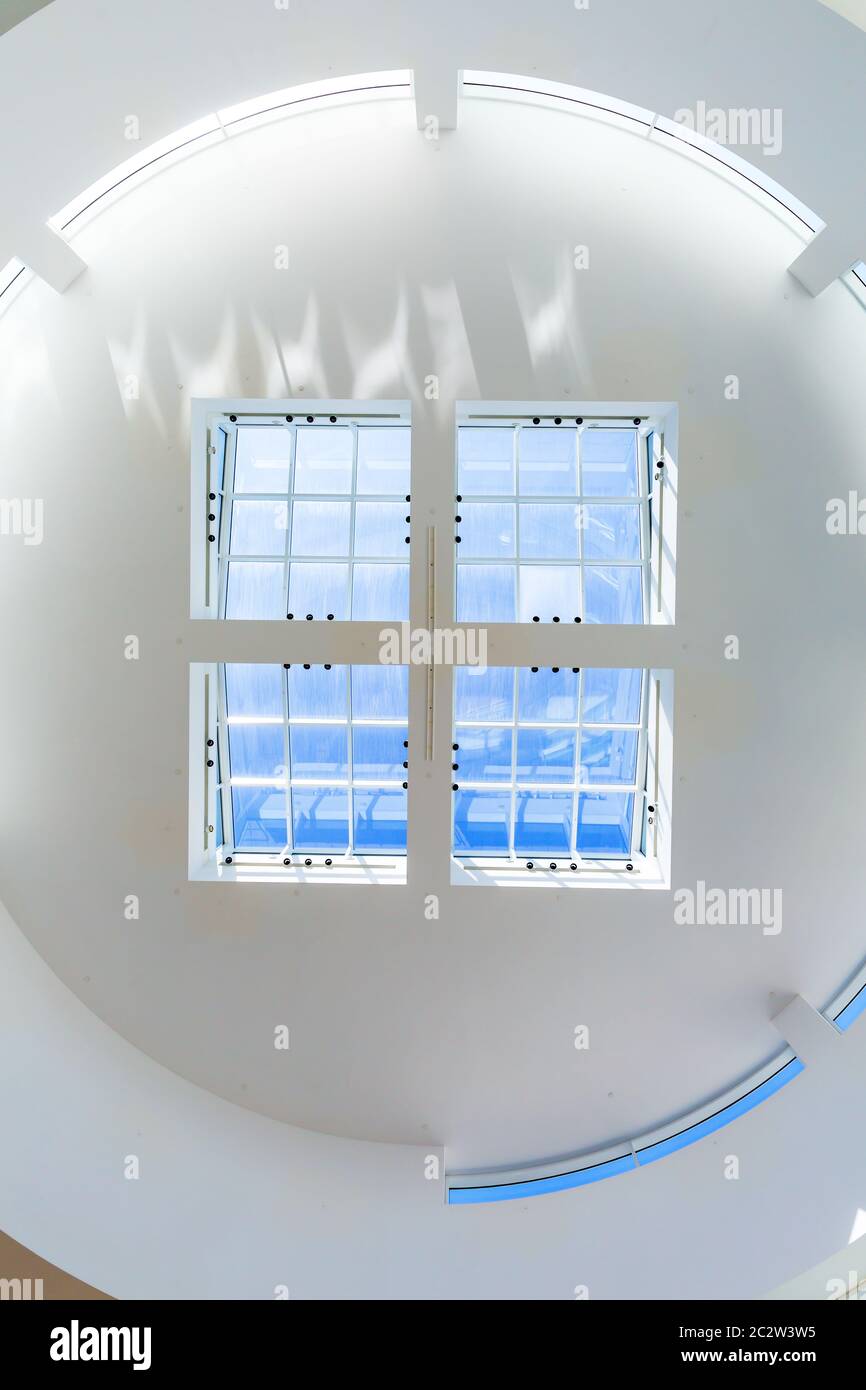 High tech building with glassed roof and white walls Stock Photo - Alamy