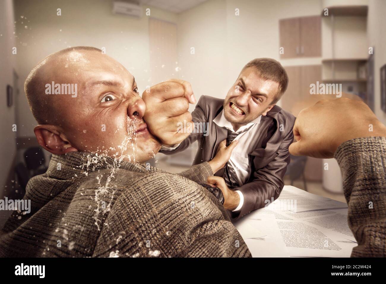 Two furious businessmen are fighting in the office Stock Photo - Alamy