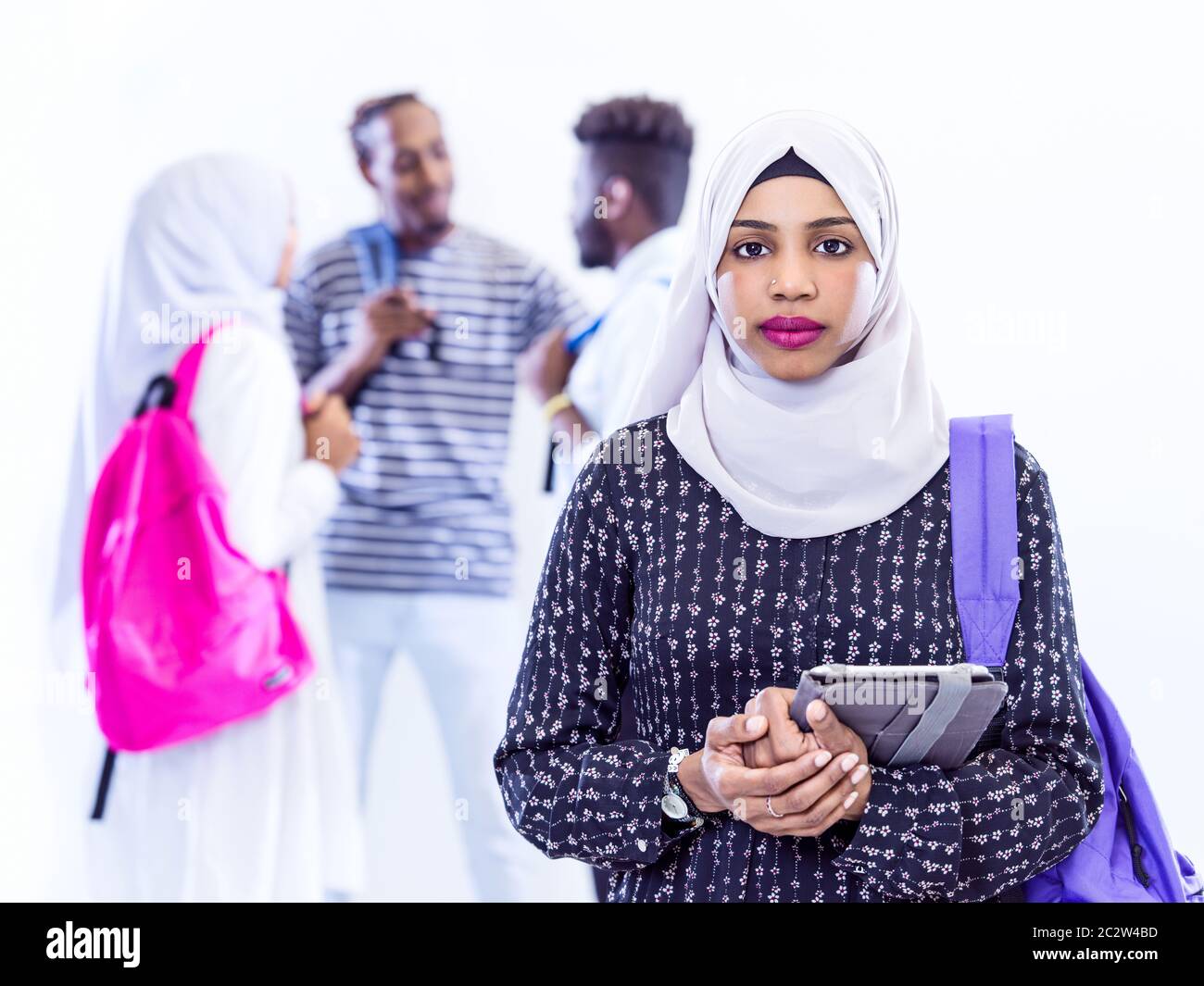 muslim female student with group of friends Stock Photo - Alamy
