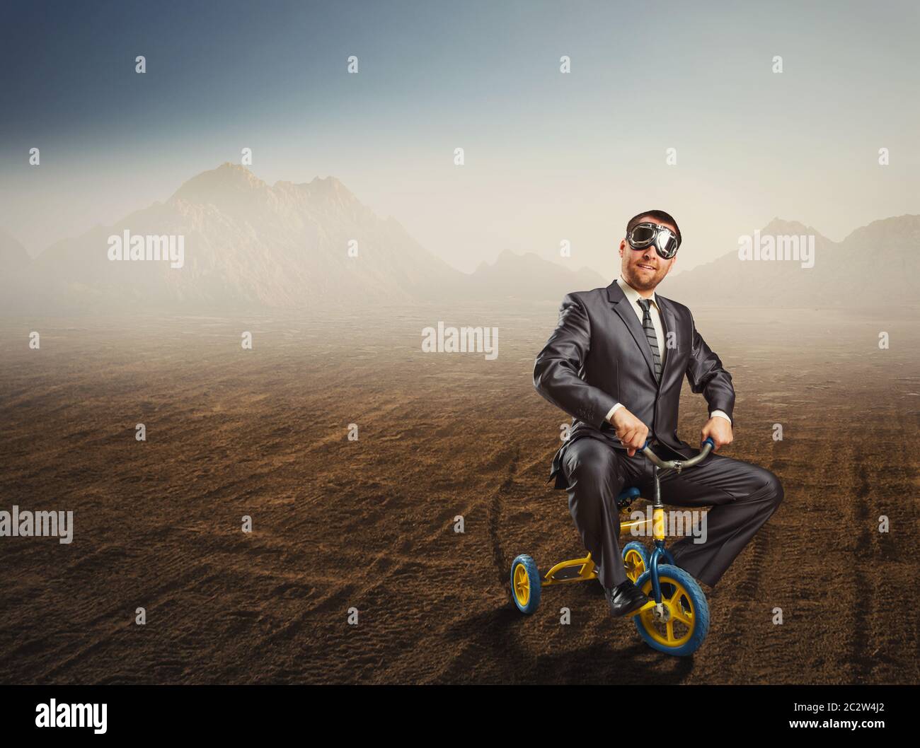 Crazy Young Man Riding A Small Bike High Resolution Stock Photography ...
